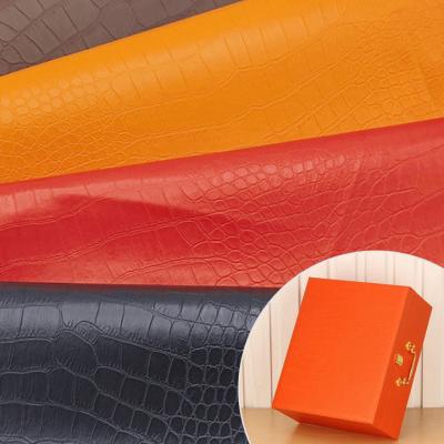中国 PVCクロコダイルグレイン合成皮革ウォレットケースシューズノートブックレザーファブリック 販売のため