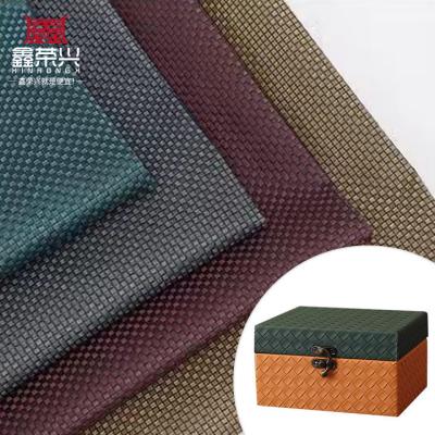 China Pvc Small Woven Grain Artificial Synthetic Leather for Background Wall Packing Box Notebook Mat Faux Leather Fabric for sale