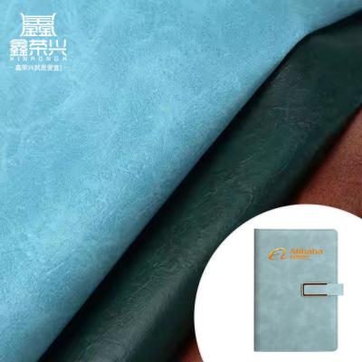 China PVC Printed Kraft Grain Synthetic Leather Artificial Faux Leather Materials for Bag Notebook Table Mat Phone Shell Packing Box for sale