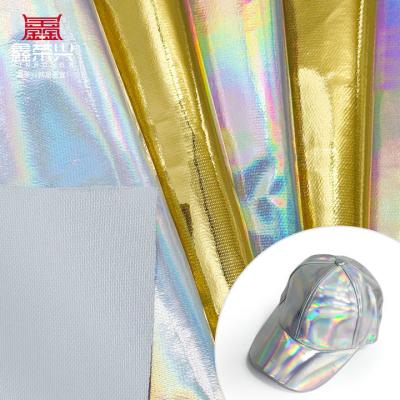Cina PVC pelle olografica laser specchio metallico pelle sintetica impermeabile materiali falsi per divano tappetino da tavolo scarpe da bagno in vendita
