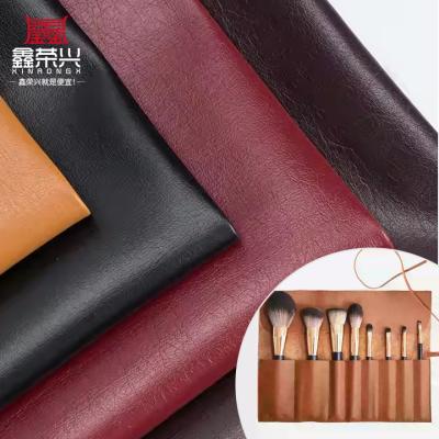 China 0.7mm Thickness 140cm Width Knitted Backing PVC Leather Faux Fabric for Bags Sofa and Furniture for sale
