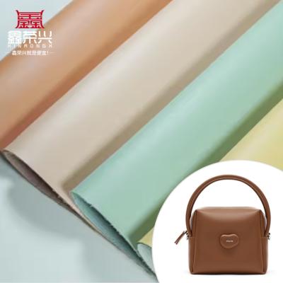 China 1.8mm Thickness 54/55" Width 40 Colors PVC Leather for Bags with Suede Backing and Embossed Pattern for sale