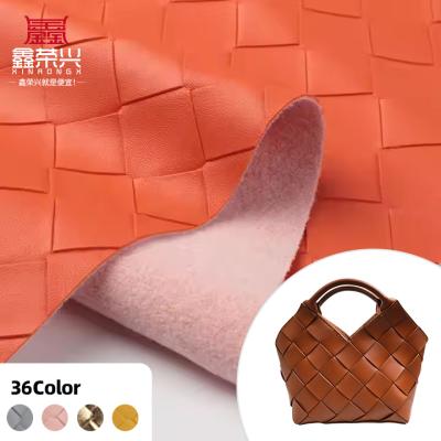 China 1.1mm Thickness 54/55" Width PVC Leather with 75 Colors for Placemat Decorate Sofa Handbag Faux Leather Fabric for sale