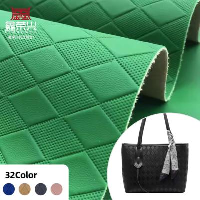 中国 ダイヤモンド・スクエア・グレーン・パターンのPVC革 34色 1000ヤードのMOQと100000メートルの生産能力で利用可能 販売のため