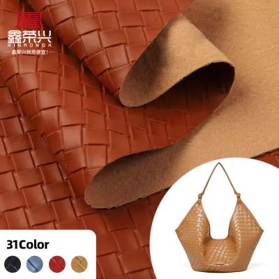 China PVC 1.1mm Elastic Embossed Synthetic Leather Fabric Waterproof Sofa Bag Chair Car Seat Gloves Decorative Belt Lining for sale