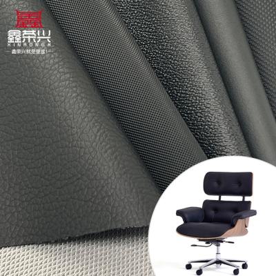 China Various Litchi Punch Pinhole Texture PVC Synthetic Leather Embossed Cheap Price Faux Leather for Chair Sofa Car Foot Bag for sale