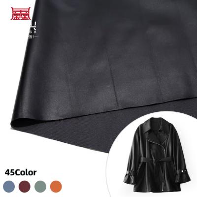 China Elastic PU B40 Napa Grain Synthetic Leather Faux Leather Fabric for Clothing Bags Earphone Sleeve Box for sale