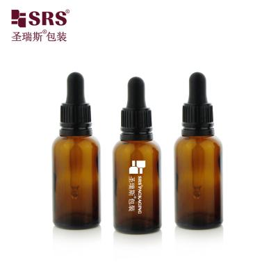 Cina D003-2 Copertura di gocciolante in plastica a spalla a nervatura per bottiglie di vetro rotonde con imballaggio di olio essenziale con logo stampato in vendita