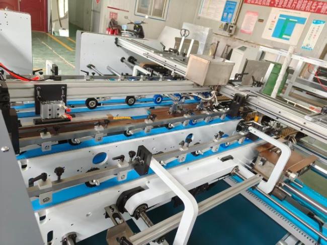 Close-up of machine's folding mechanism