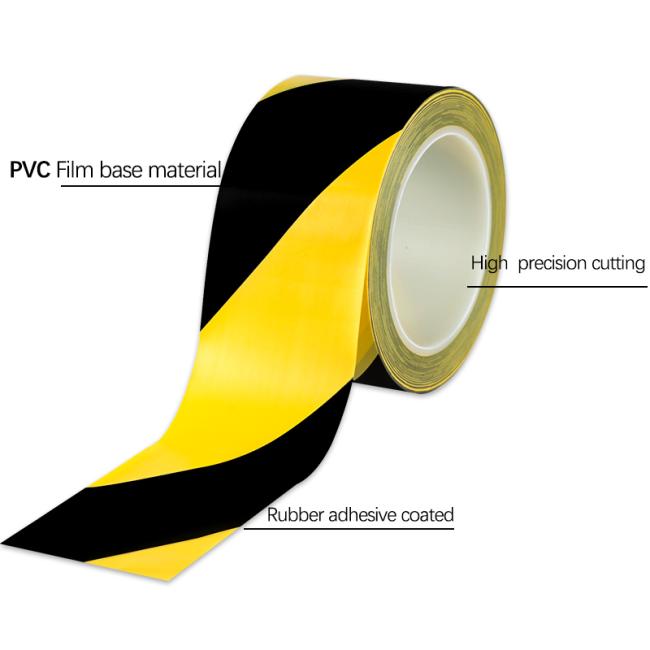 Warning tape applied on warehouse floor for safety marking