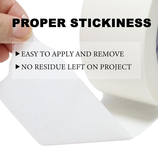 Professional painter using our masking tape for clean paint lines