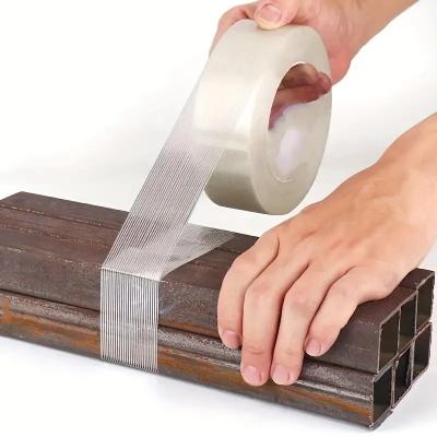 China Cross Fiber Fiberglass Reinforced Packing Tape With Rubber Adhesive And Fiberglass Mesh for sale