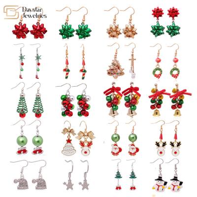 中国 女の子の休日の木の鐘の雪片のサンタの女性のクリスマスのイヤリング 販売のため