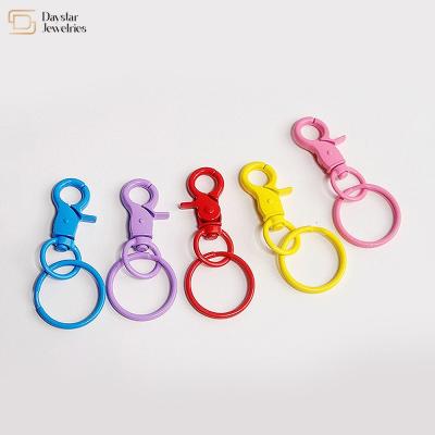 Cina L'innesco a catena chiave multiuso della parte girevole del metallo taglia i portachiavi a anello variopinti di Diy della clip improvvisa della catena chiave della primavera del catenaccio dell'artiglio dell'aragosta in vendita
