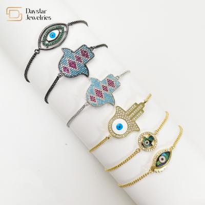 中国 Ojo ブレスレット 調節可能 18K ゴールドメッキ ジルコン ハムサ ハンド 邪眼 チャーム ブレスレット ジュエリー 販売のため