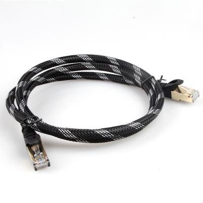 Cina Bene durevole bianco nero di nylon intrecciato del gatto 7 del cavo della toppa di Ethernet resistente alle intemperie in vendita
