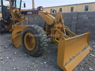 Cina Impianto di produzione Caterpillar Used Motor Grader CAT 140K 140H con secchio a lama anteriore in vendita