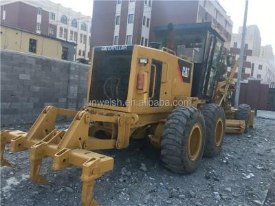 China 18000 kg Motor Detuz usado Caterpillar Motor Grader CAT 140K 140H com balde de lâmina dianteira à venda