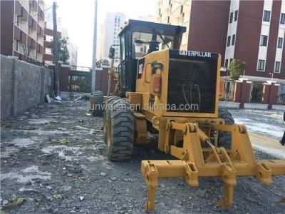 China 18000 kg Motor Detuz usado Caterpillar Motor Grader CAT 140K 140H com balde de lâmina dianteira à venda