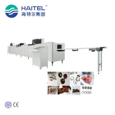 China línea acero inoxidable de la máquina de moldear de la barra de chocolate 2500kg/8h de 18time/min en venta