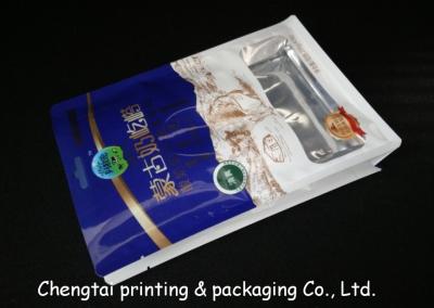 Cina I mezzi sacchetti di plastica di alluminio laterali del fondo piatto di incisione stanno sui sacchetti con la tacca dello strappo in vendita