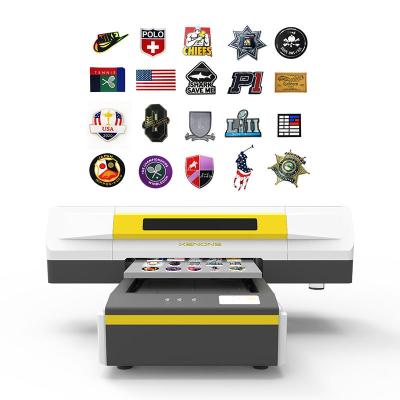 Cina 6090 3D logo dtf uv crystal cold transfer film UV Printer for glass wood metal acrylic in vendita