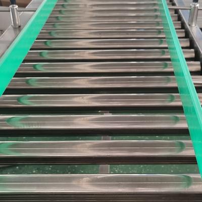 China Assembled Line Roller Table Conveyor Gravity Belt Roller Conveyor System For Boxes Bags Trays Transmission for sale