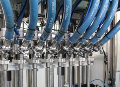 China Automatic Anti Dripping Piston Type Hair Oil Serum Bottle Filling Machine for sale