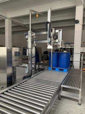 China Flexible Npack Automatic Weighing Type Oil  Filling Machine For 200L Drum And IBC for sale