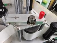 China Npack Plastic Pet Glass Round Bottle Sticker Labeling Machine with Fully Automatic Function for sale
