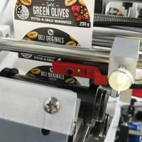 China Automatic PLC Control Flat Surface Bottle Labeling Machine For Top And Bottom Labels for sale