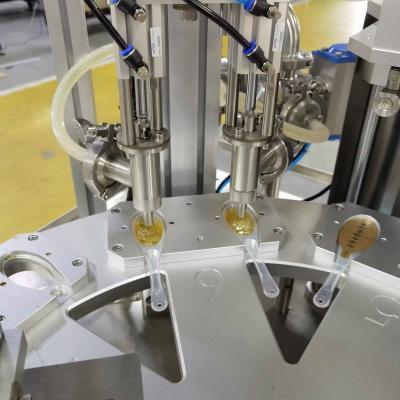China Automatic High Speed  7g 10g 15g Honey Spoon Filling Machine with PLC Control for sale