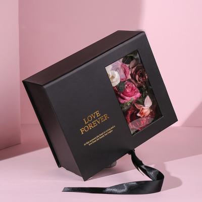 Cina Contenitore di regalo di carta rosa magnetico del flat pack su ordinazione di colori con il nastro in vendita