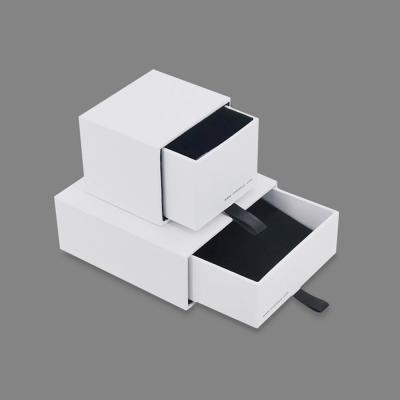 Cina Confezione Anello Portagioie Bianco Con Cassetti Fodera In Velluto Grigio O Nero in vendita