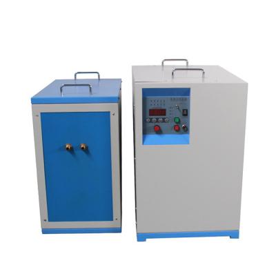 China Forno de aquecimento por indução magnética para tubos de aço, potência de saída 40kw, frequência de 0,5MHZ-1,1MHZ à venda