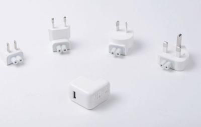 China wall amount charger 5V 1.5A interchangeable ac plug for ipad and mobile phone paper packing free sample and shipping for sale