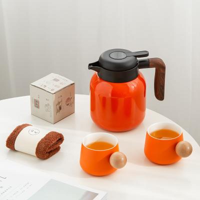 Cina Presentazione personalizzata Set regalo teiera in ceramica 2 tazze asciugamano 6 pezzi di tè bianco in vendita