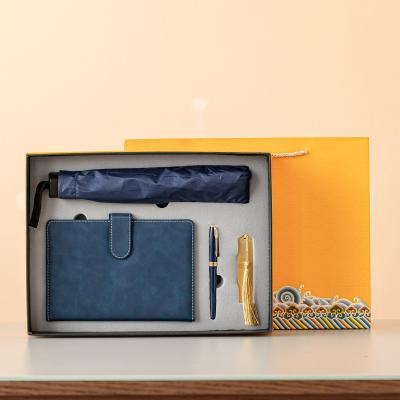 China Four Piece Business Gift Set Notebook Pen Bookmark and Umbrella with Customized Logo for sale