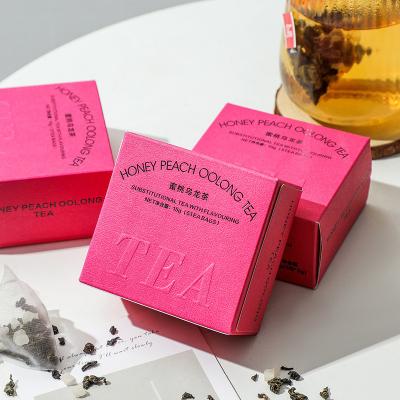 Cina Relazioni con gli ex studenti Tè regalo Pesco Oolong Tè in imballaggio stampato a caldo Attività 8 marzo in vendita