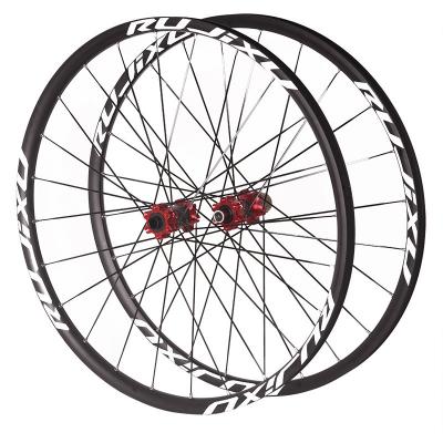 Cina Set di ruote per mountain bike da 26 pollici con 24 fori per raggi, cerchio in lega di alluminio ultraleggero, set di ruote per freno a disco in vendita