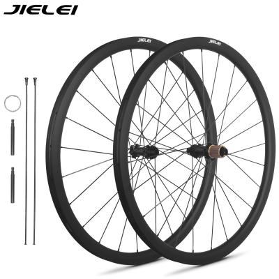 China JIELEI Hoge Kwaliteit 32mm Carbon Fietswielset 700c 24 Gaten Vier Klauw Clincher Schijfrem Tubeless Wiel Te koop
