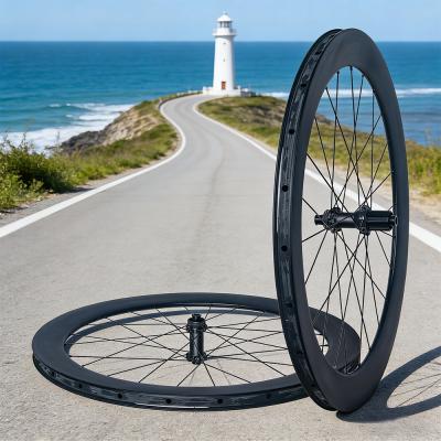 China 700C Disc Brake Wheelset with 60mm High Profile Carbon Fiber Rim and 36T Ratchet Hub Featuring Center Lock Brake System for sale