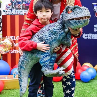 China Silicone Lifelike Baby Dinosaur Hand Puppet 110/220VAC For Holiday for sale