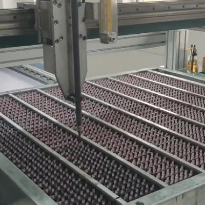 中国 ±1%の塗布精度とサイクルタイム40%短縮を実現した、リモートメンテナンス対応グルーポッティングマシン 販売のため