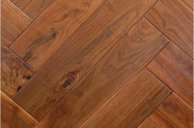 China hand scraped herringbone design acacia walnut flooring for sale