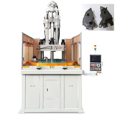 China Automobile Parts Making Machine Vertical Rotary Table Injection Molding Machine for sale