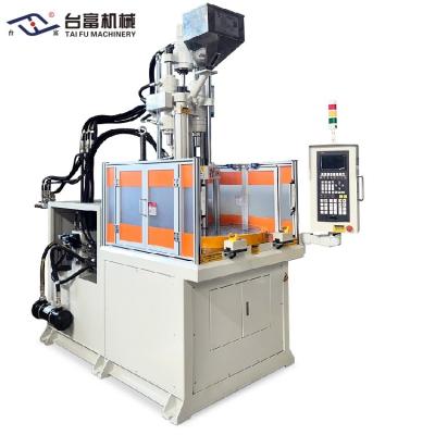 Cina 35 tonnellate macchina di stampaggio a iniezione verticale rotativa utilizzata per sensori ottici in vendita