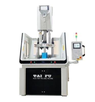 Cina 85 Ton Rotary Vertical Injection Molding Machine For Safety Hammer in vendita