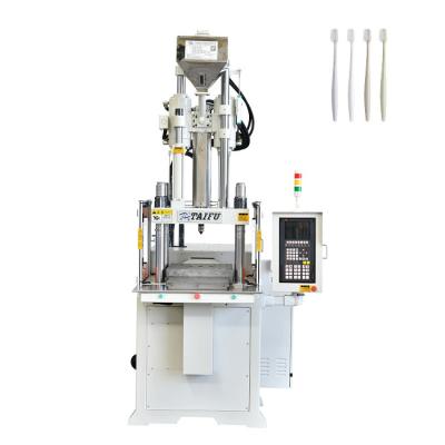 Cina 55 tonnellate singolo scivolo Verticale iniezione stampaggio macchina per la fabbricazione di spazzolini da denti in vendita