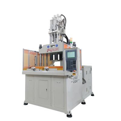 Cina 160 tonnellate due colori Verticale iniezione stampaggio macchina per la fabbricazione di bambini stoviglie in vendita